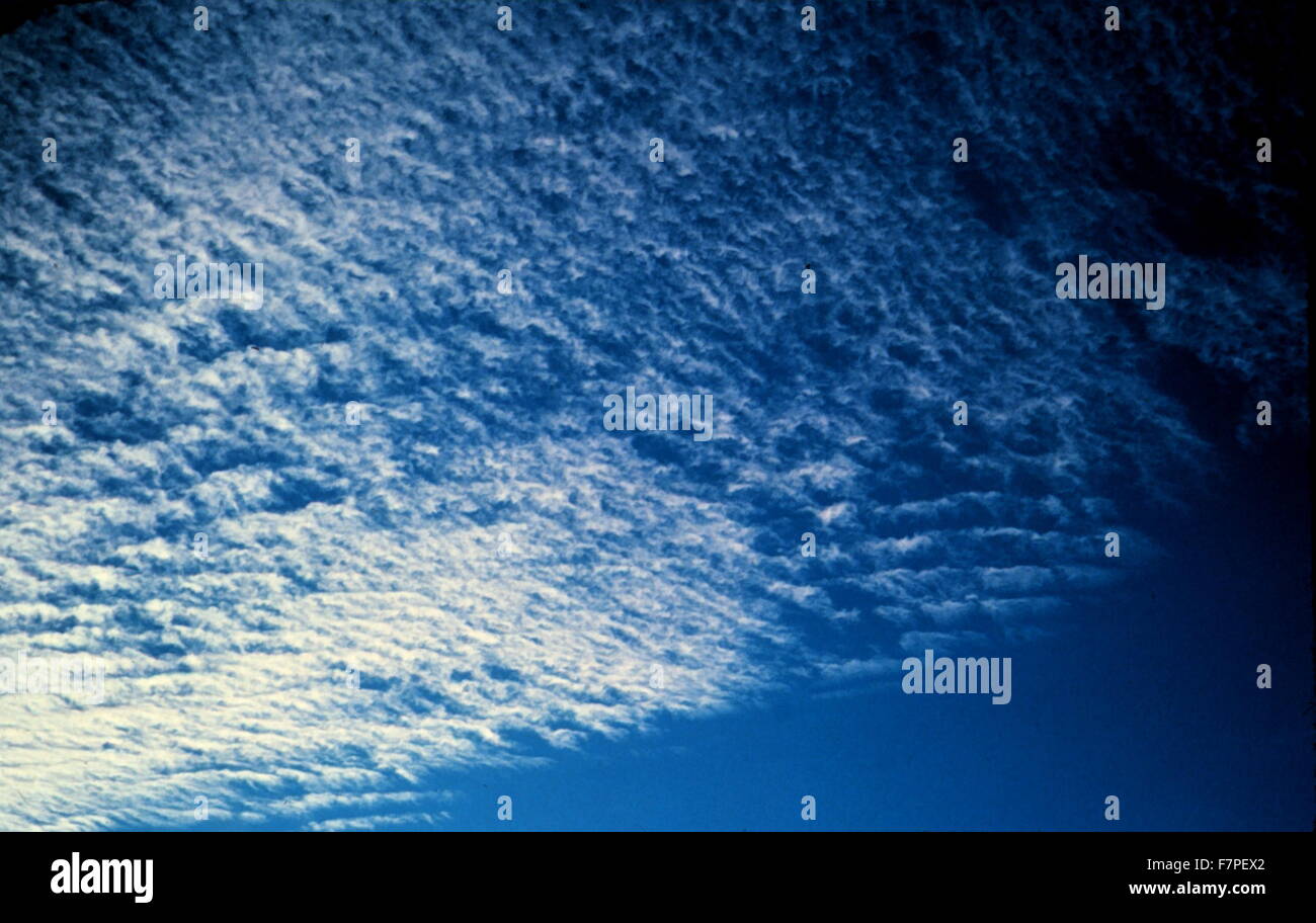 Photograph of Altocumulus cloud, a middle-altitude cloud genus that ...