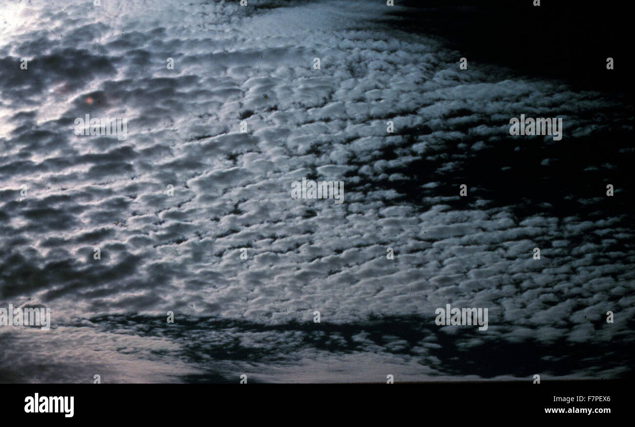 Photograph of Altocumulus cloud, a middle-altitude cloud genus that ...