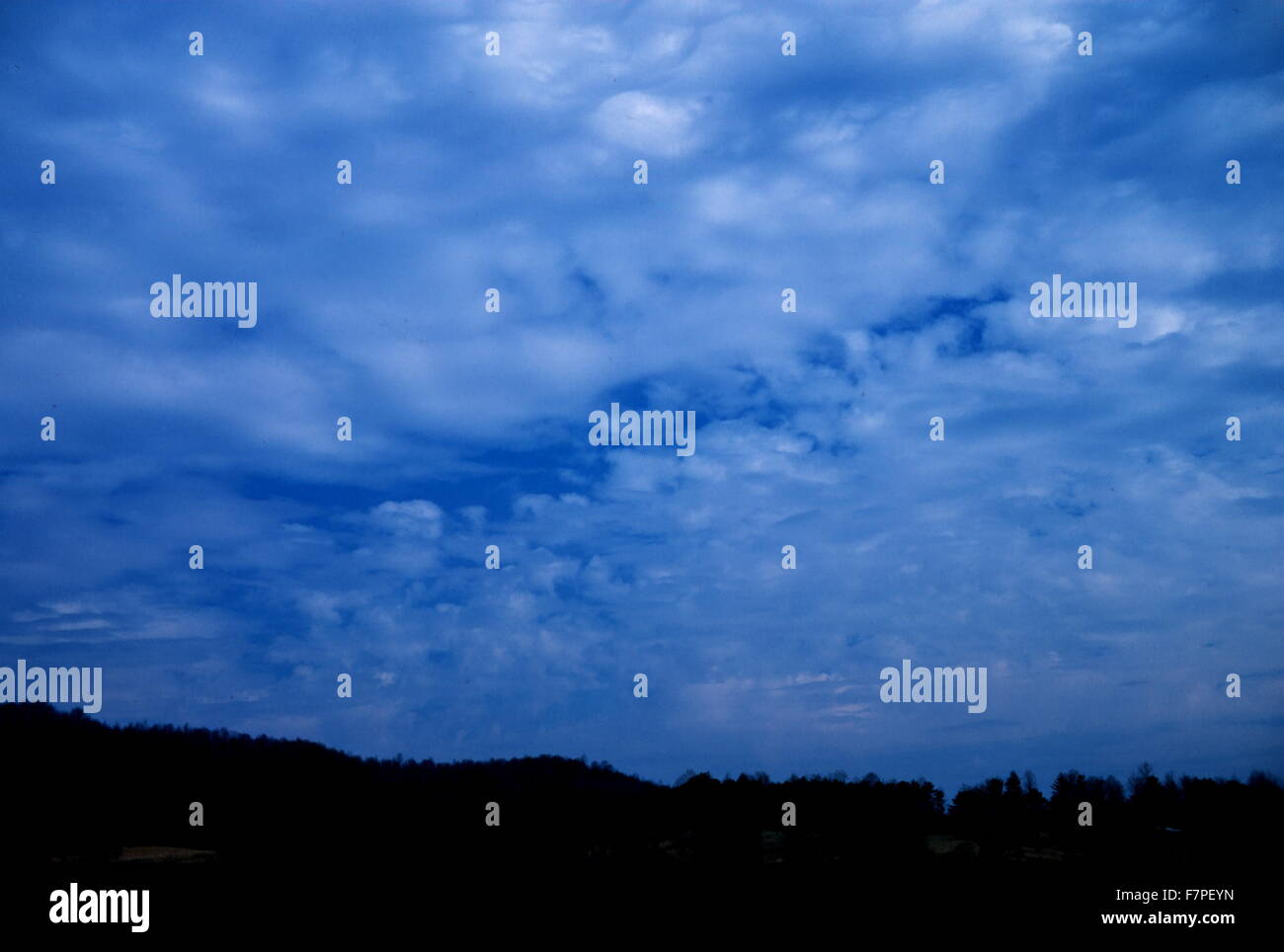 Photograph of unstable Altocumulus cloud, a middle-altitude cloud genus ...