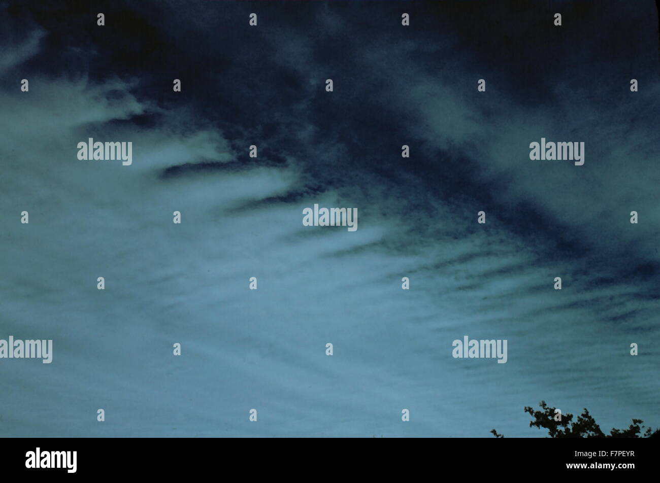 Photograph of Altocumulus cloud, a middle-altitude cloud genus that ...