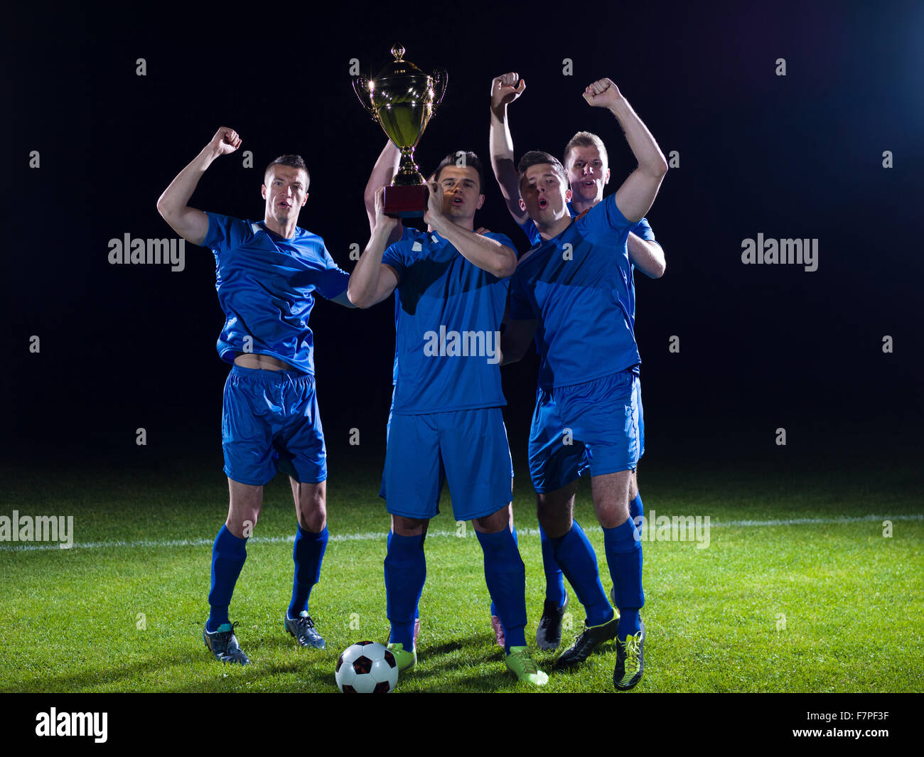 soccer players team group celebrating the victory and become champion ...