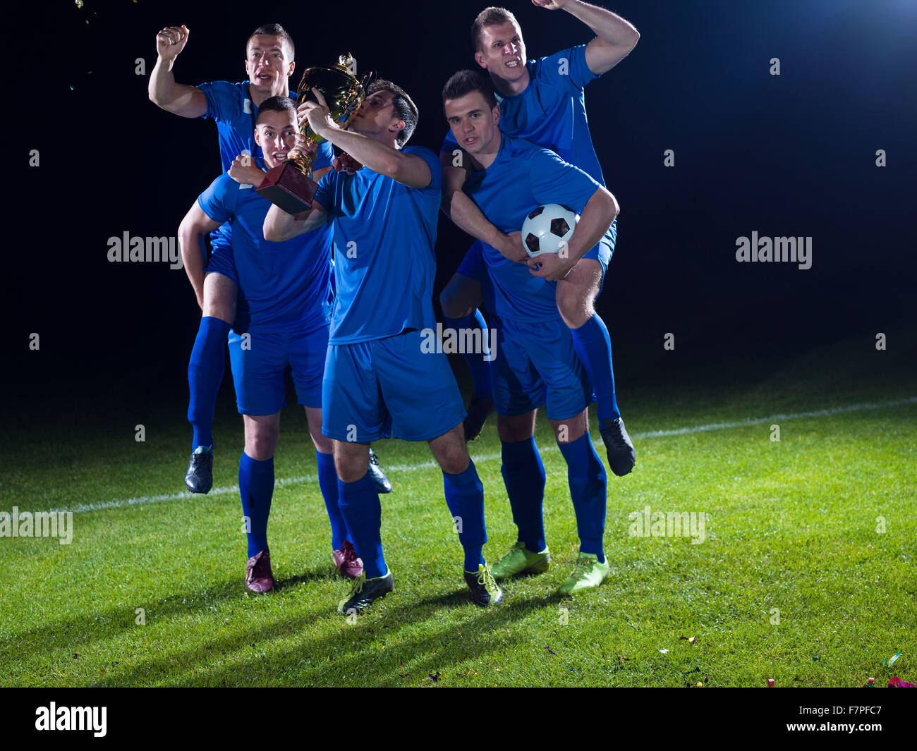 soccer players team group celebrating the victory and become champion ...