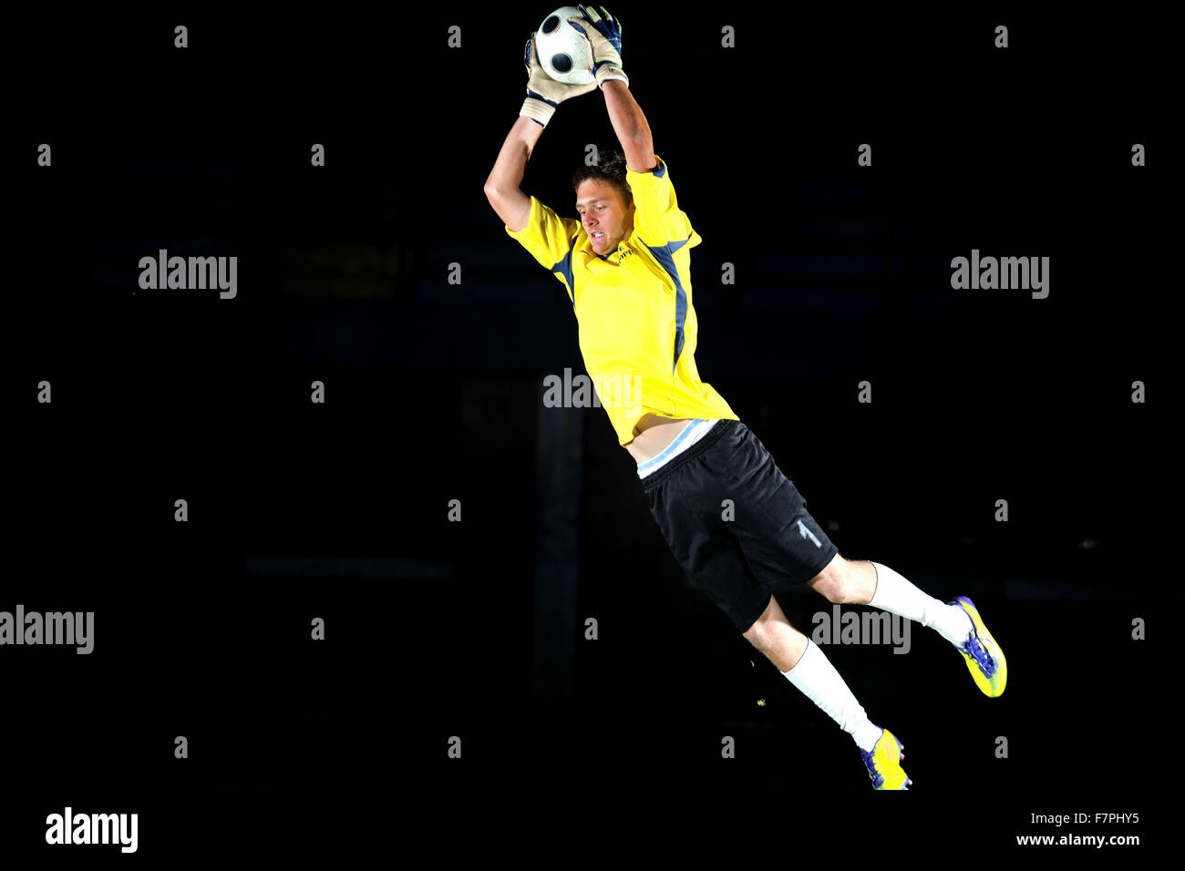 goalkeeper soccer player people on football stadium grass field Stock ...