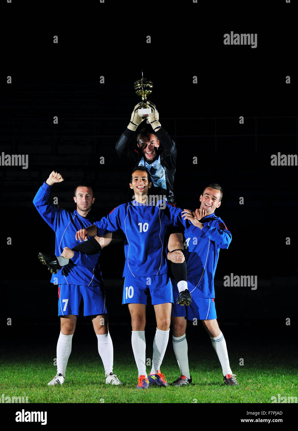 football players team group celebrating the victory and become champion ...