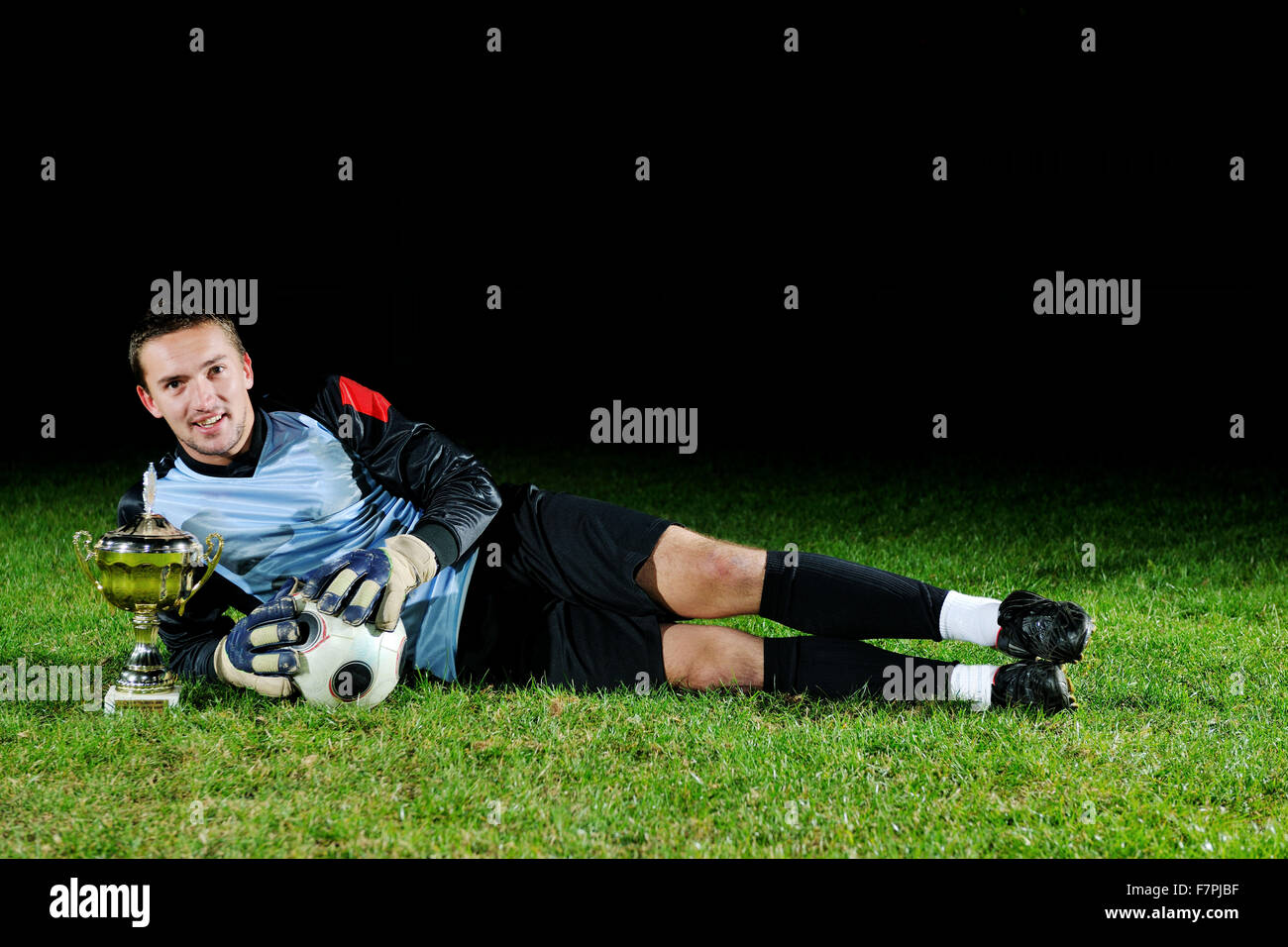 goalkeeper soccer player people on football stadium grass field Stock ...