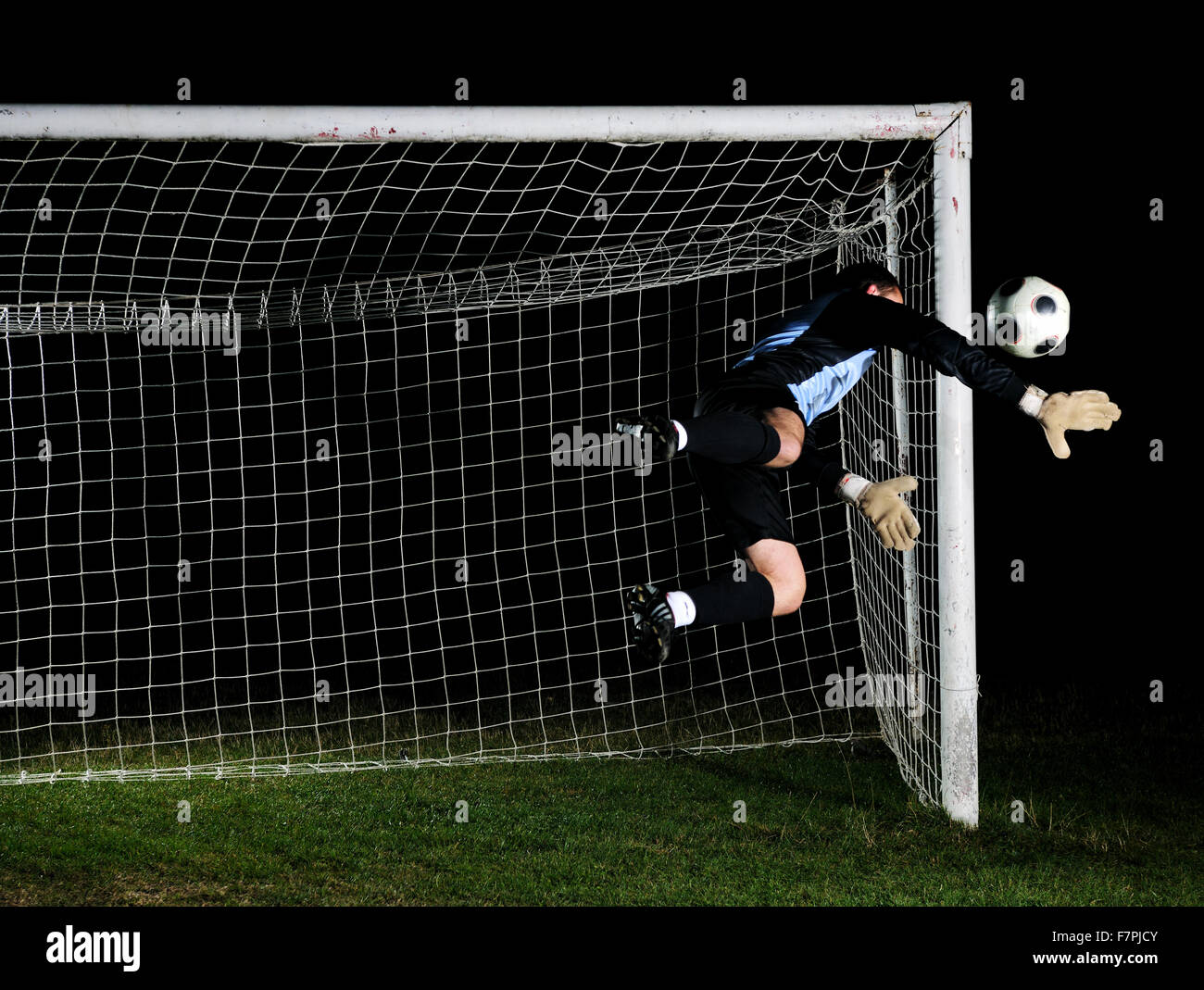 goalkeeper soccer player people on football stadium grass field Stock ...