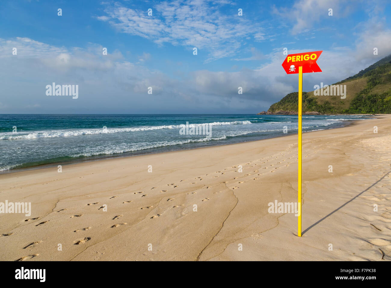 Marisa beach in Sao Paulo - small beach sign adverting to "danger ...