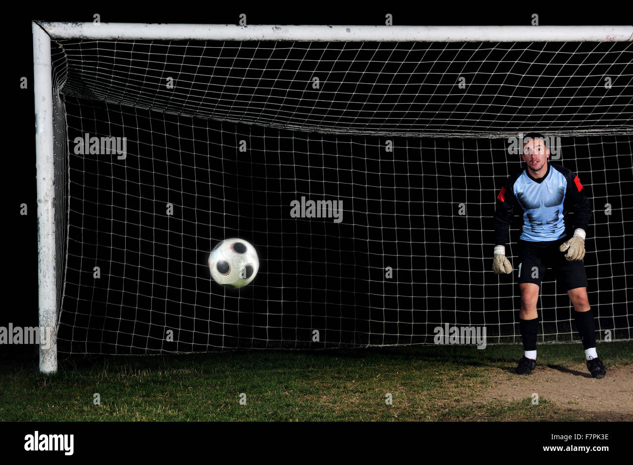 goalkeeper soccer player people on football stadium grass field Stock ...
