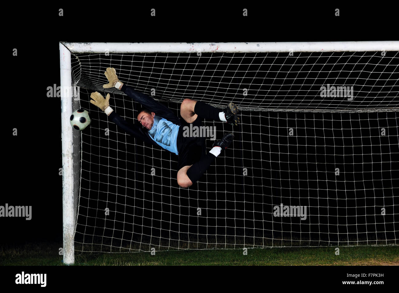 goalkeeper soccer player people on football stadium grass field Stock ...