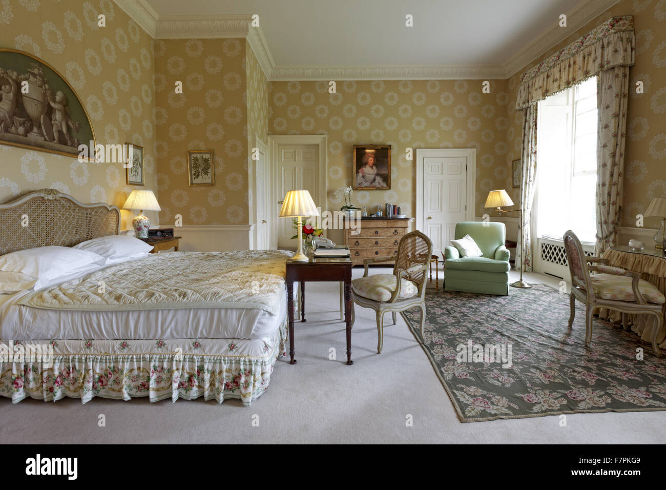 A bedroom at Hartwell House, Buckinghamshire. Hartwell House is part of ...
