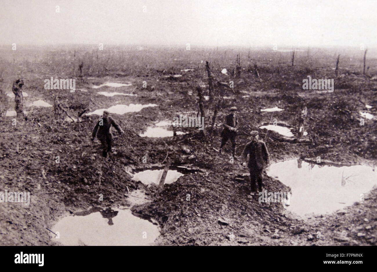 soldiers walking through mud in France during World War One. Dated 1914 ...