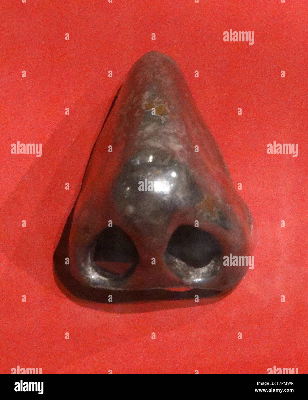An artificial nose made from plated metal. An early example of ...
