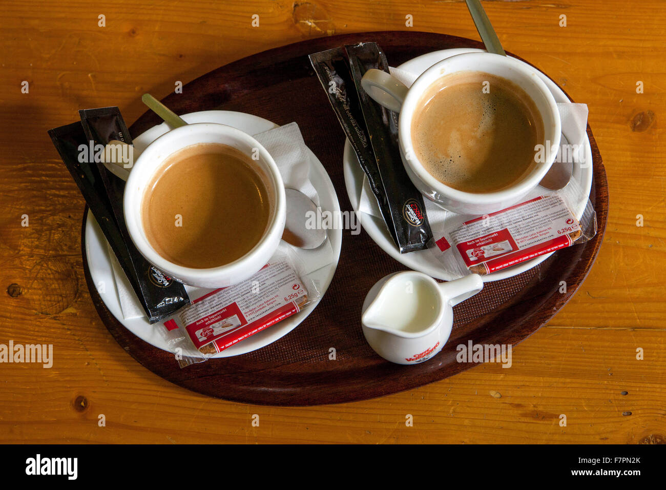 Two coffee cups on a tray, Prague cafe bar Stock Photo - Alamy