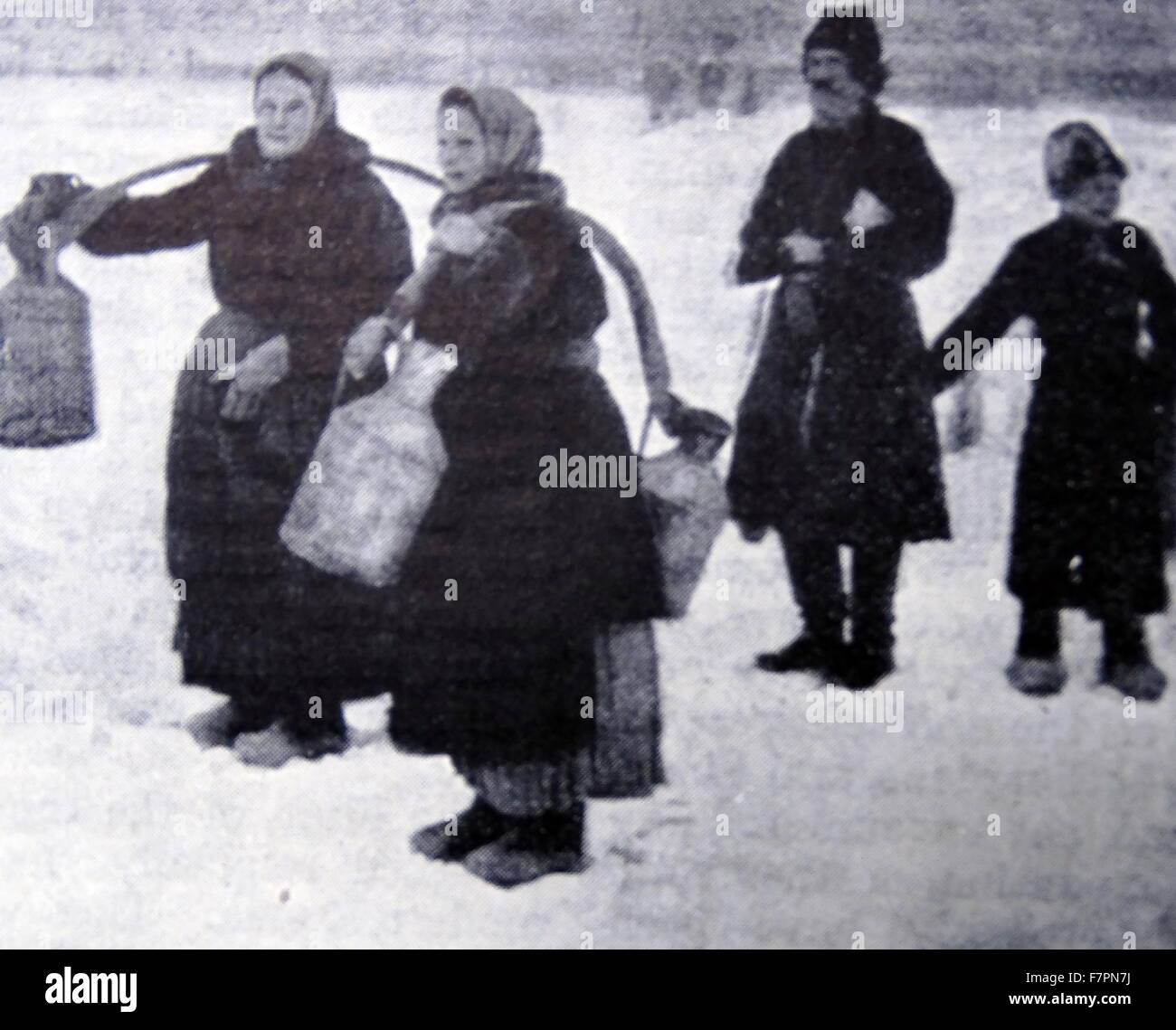 Finnish milk-sellers pictured in a typical winter scene Stock Photo - Alamy