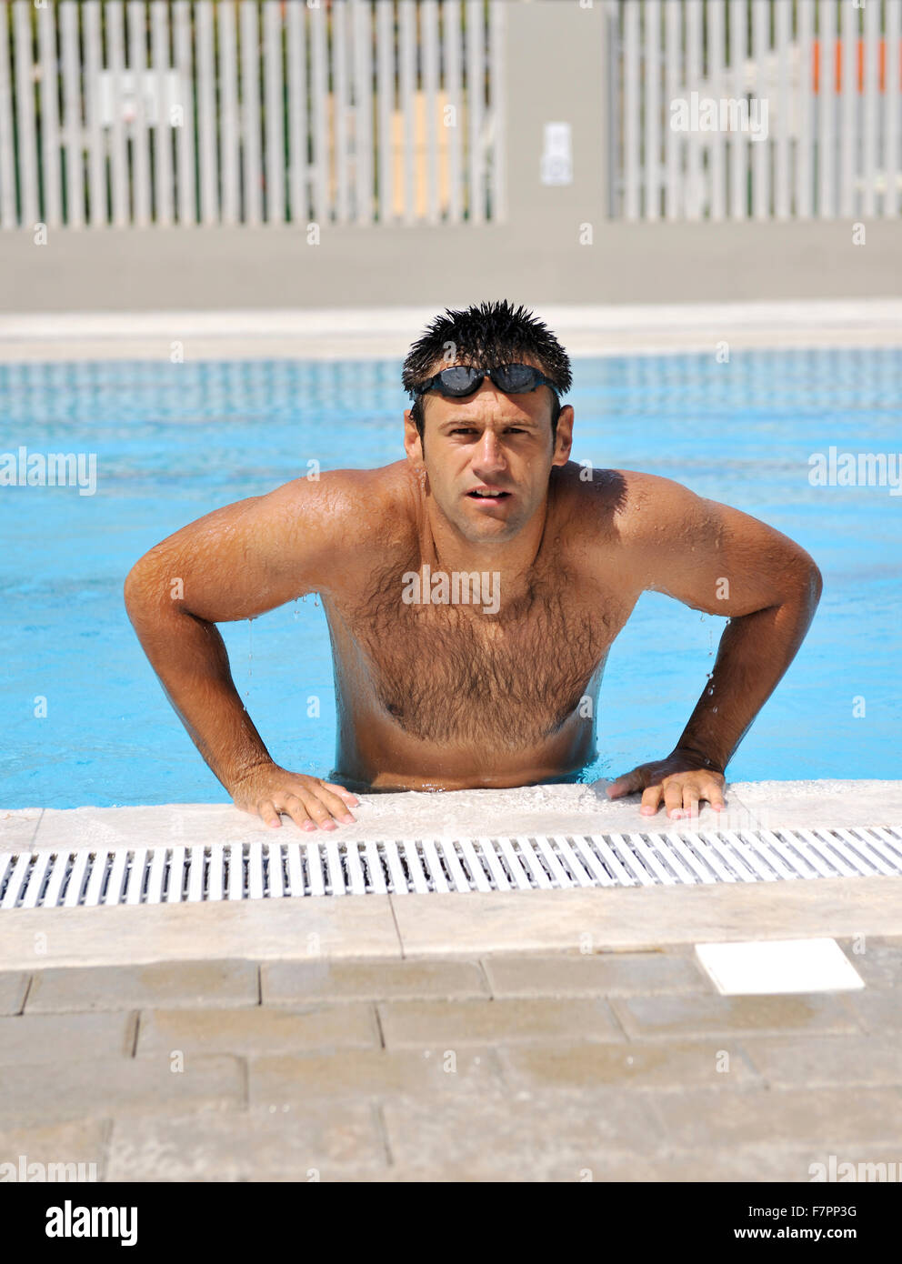 young healthy athlete man exercise at poolside Stock Photo - Alamy