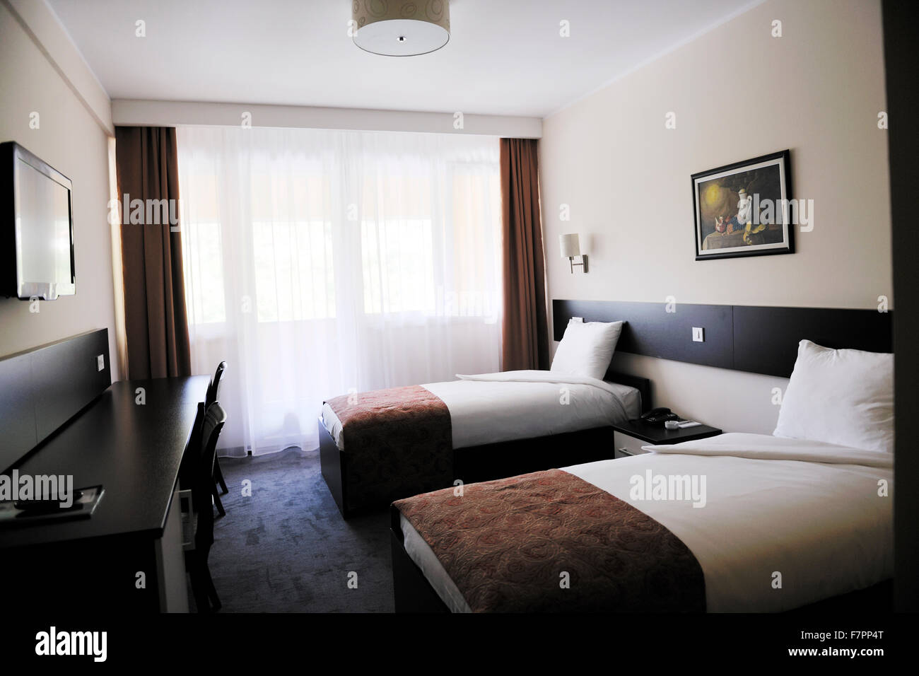 bright and clean hotel room interior with modern furniture Stock Photo ...