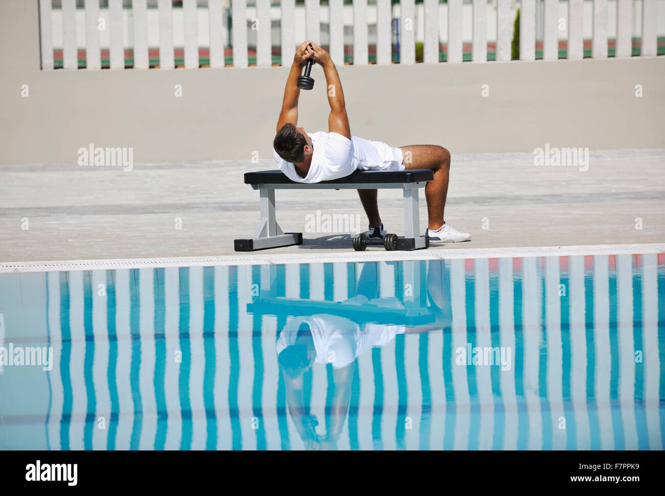 young healthy athlete man exercise at poolside Stock Photo - Alamy