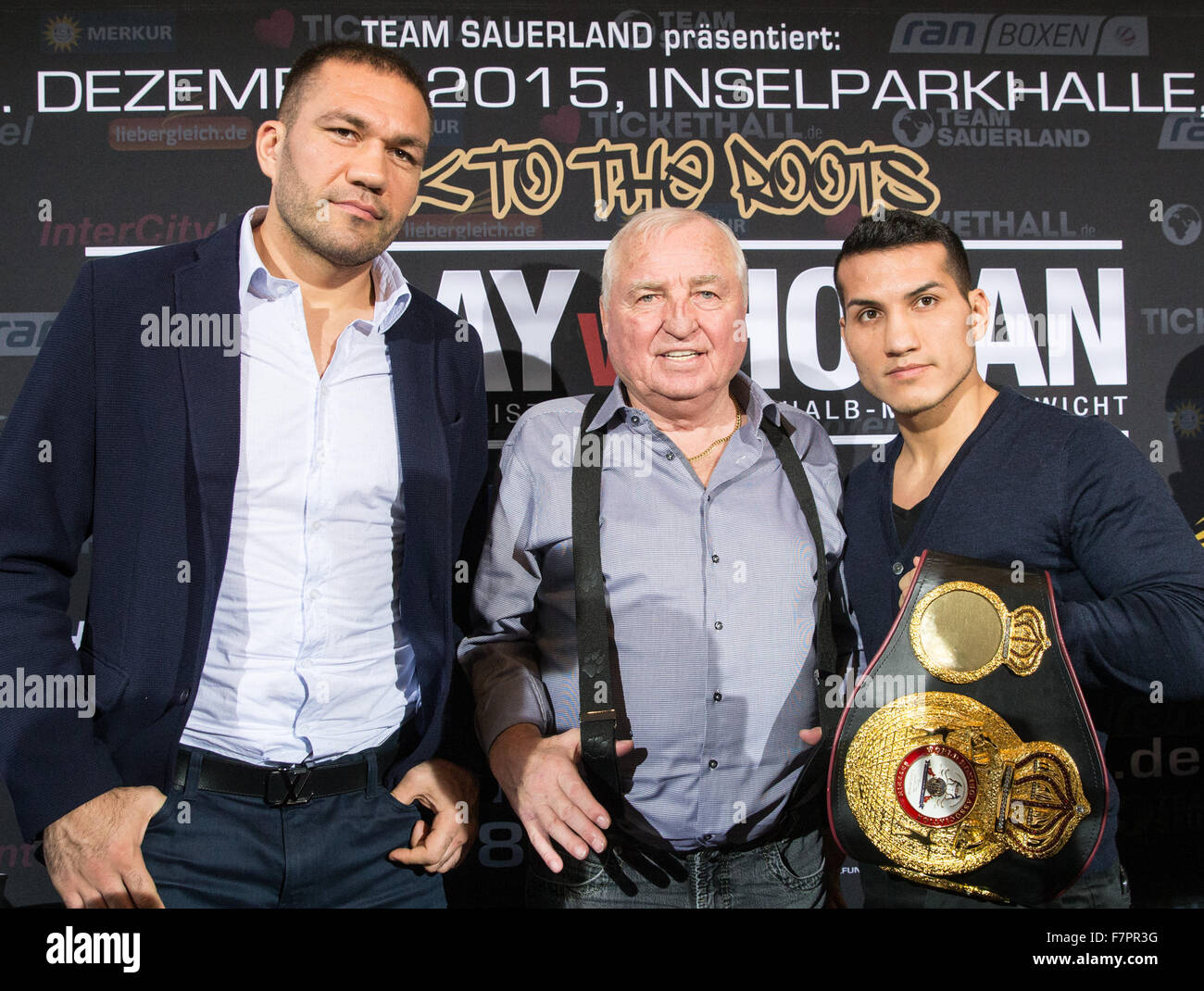 Hamburg, Germany. 02nd Dec, 2015. Boxing coach Ulli Wegner (C) and his ...