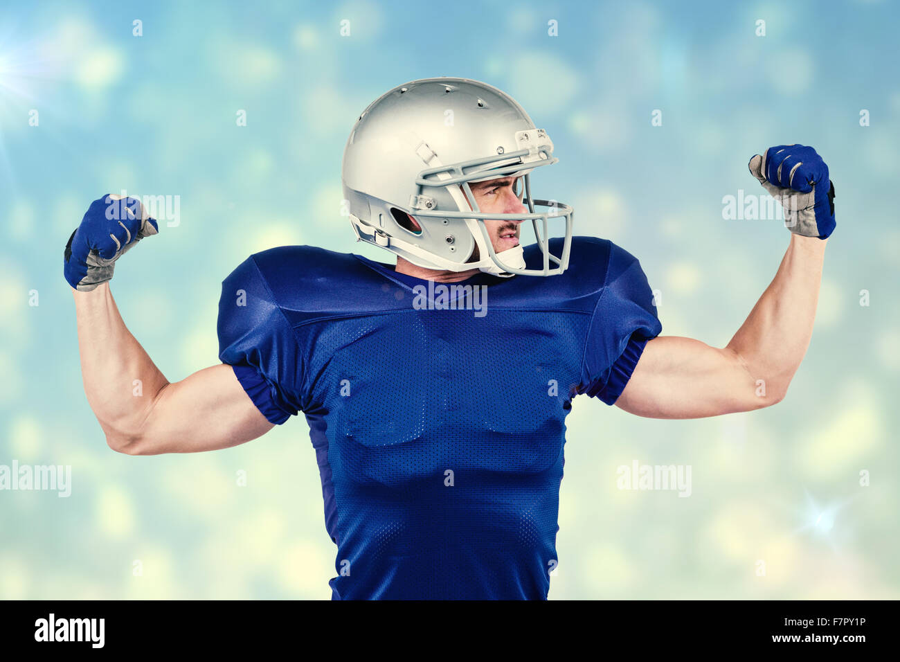 American football player flexing muscles hi-res stock photography and ...