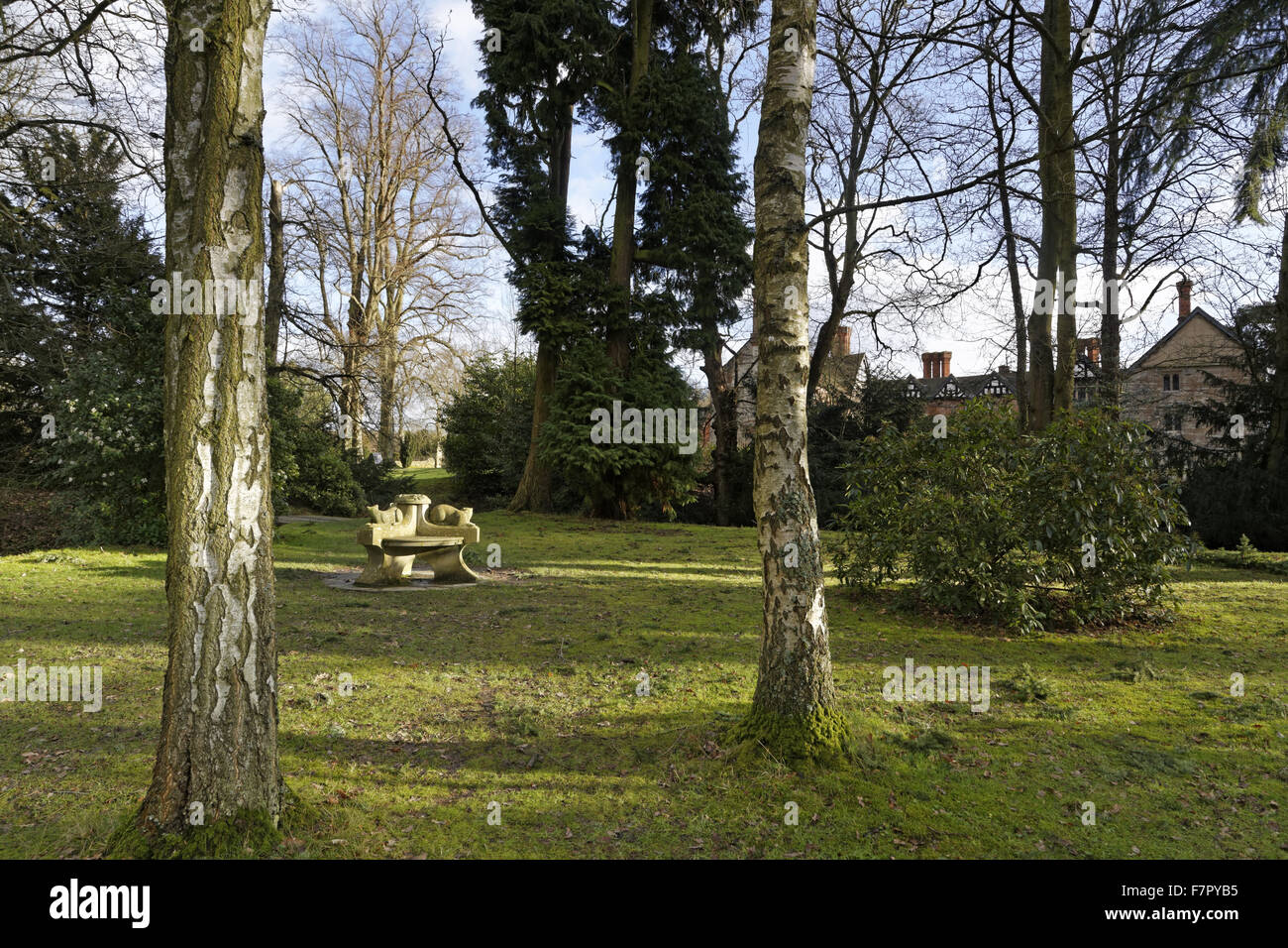 View through the trees to the house at Baddesley Clinton, Warwickshire ...