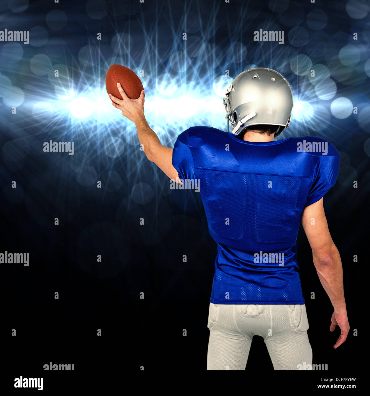 Quarterback holding ball hi-res stock photography and images - Alamy
