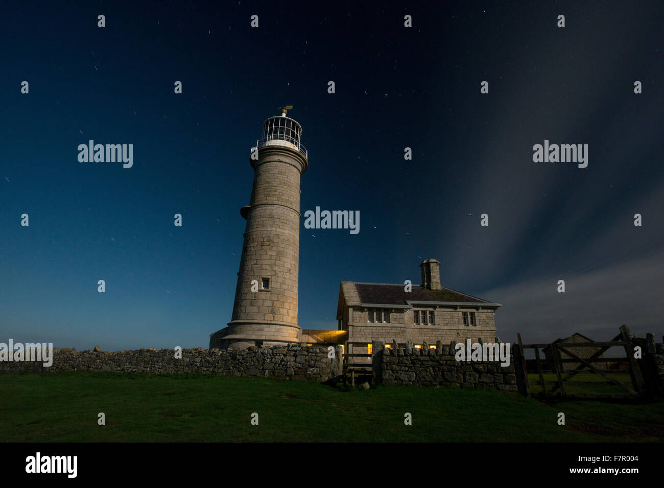 Lundy Old Light lighthouse against a deep blue night sky Stock Photo ...