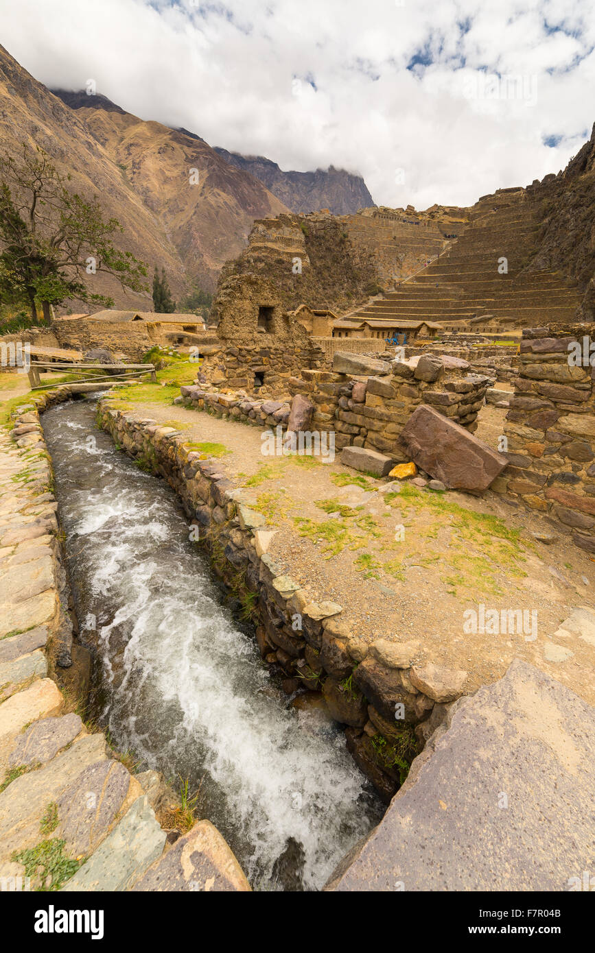 Inca's water canal in the archeological site of Ollantaytambo, Sacred ...