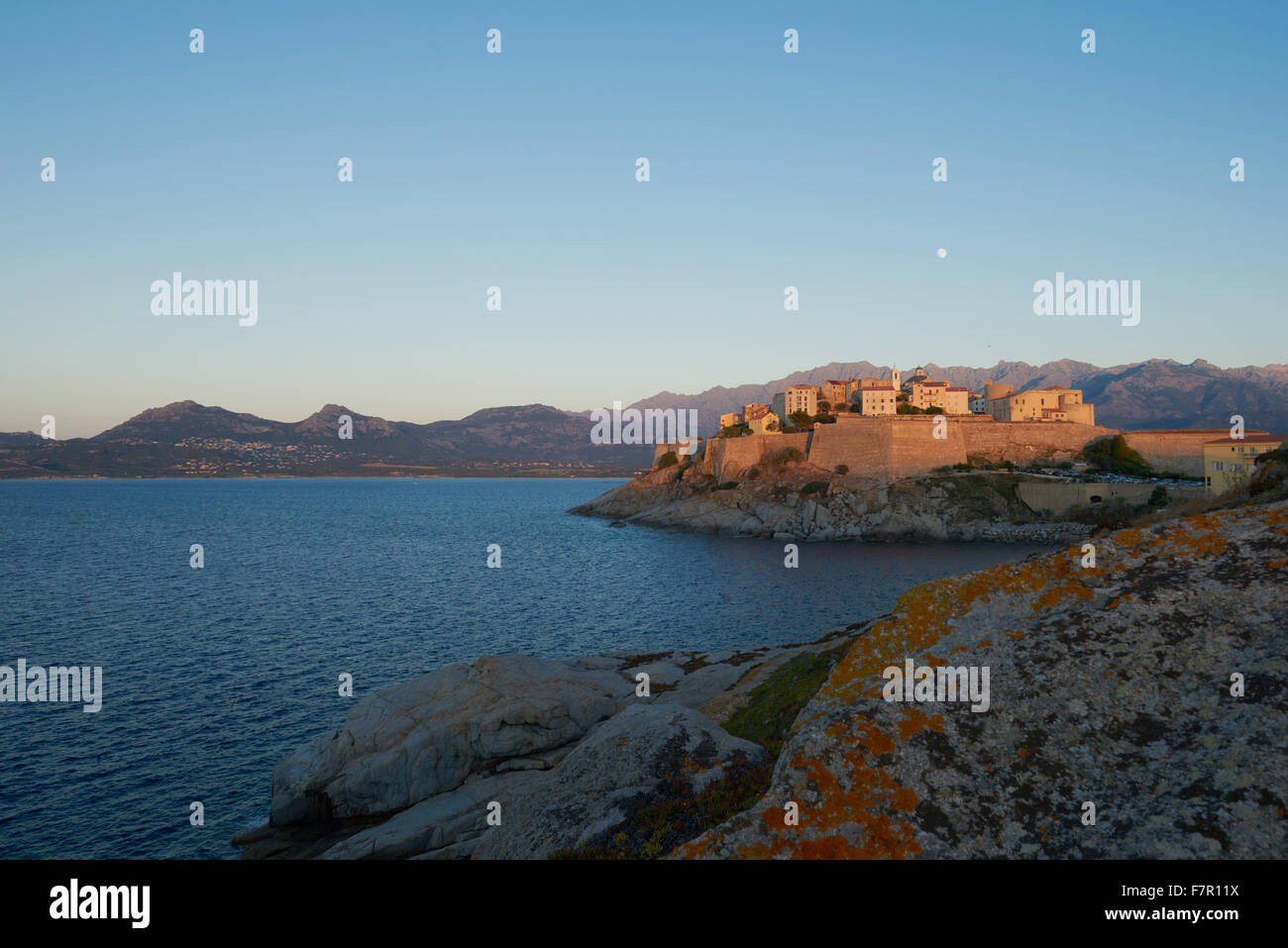 Calvi in the evening sunset seen from the western side Stock Photo - Alamy