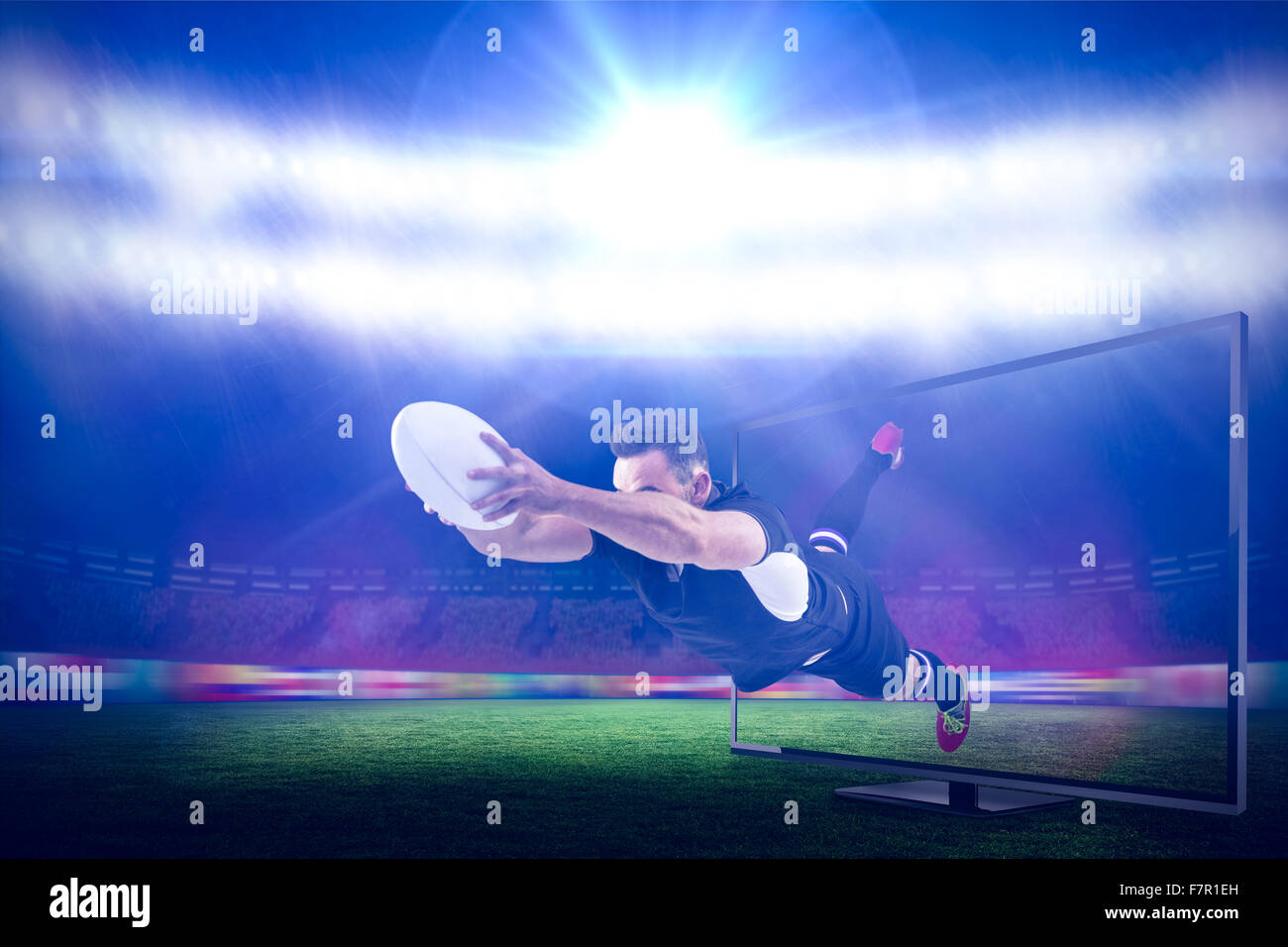 Composite image of rugby player scoring a try Stock Photo - Alamy