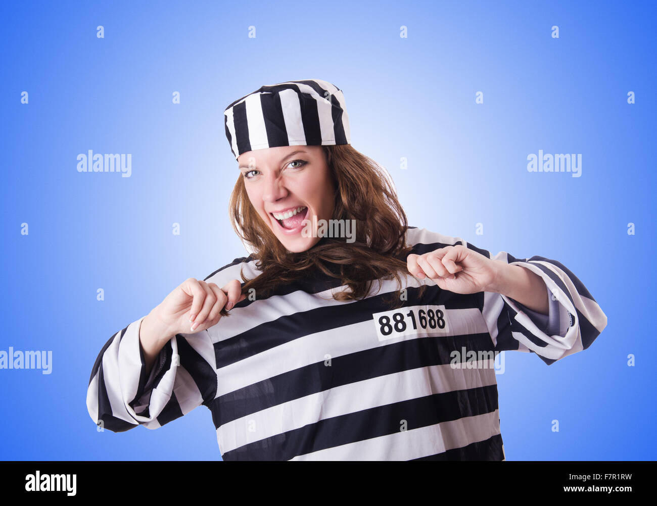 Convict criminal in striped uniform Stock Photo - Alamy