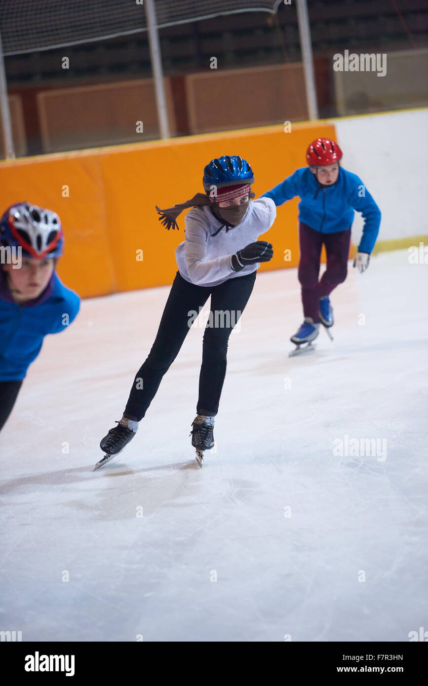 children speed skating sport Stock Photo - Alamy