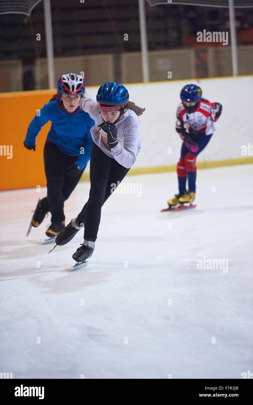 children speed skating sport Stock Photo - Alamy