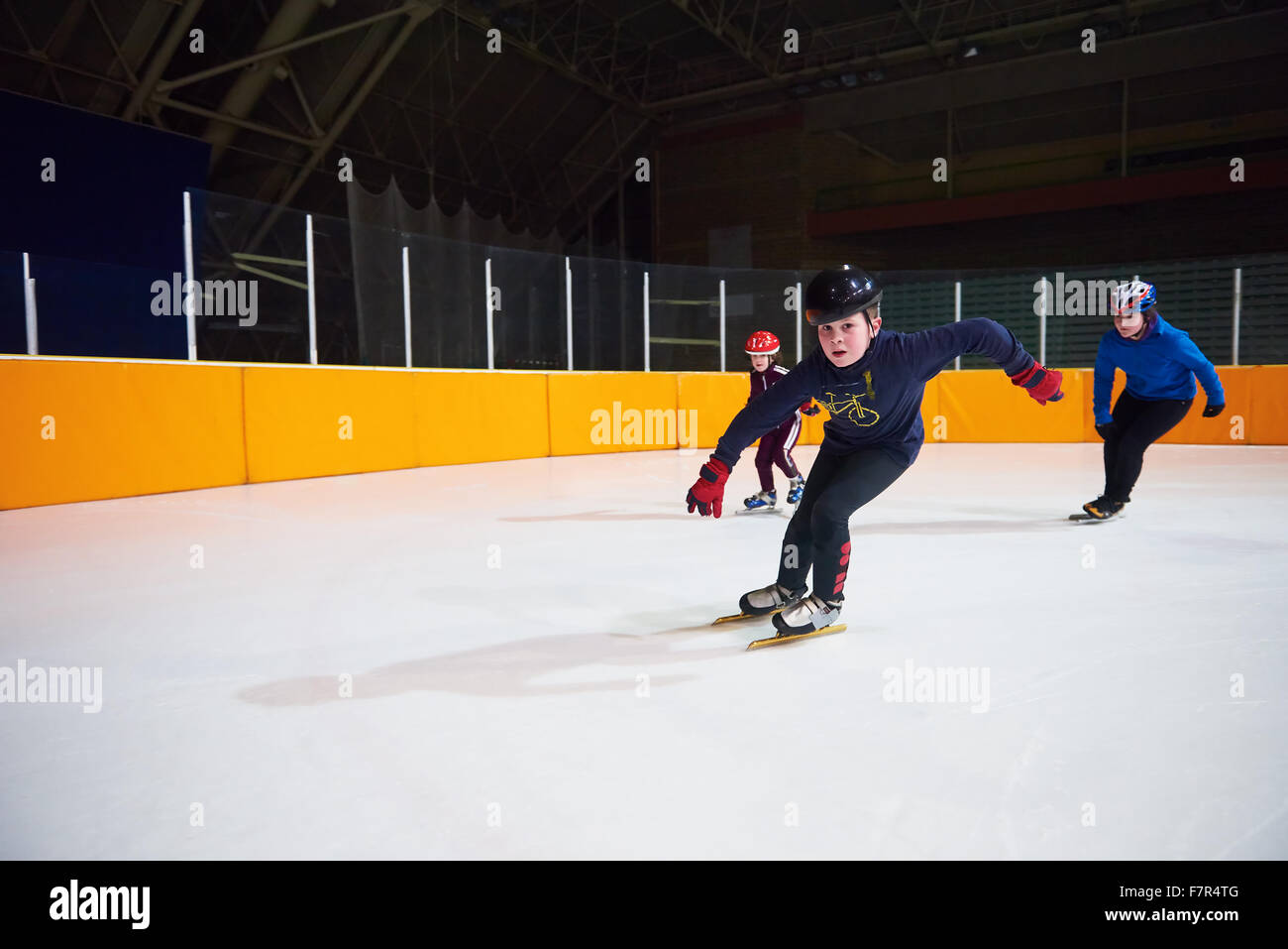 speed skating sport with young athletes Stock Photo - Alamy