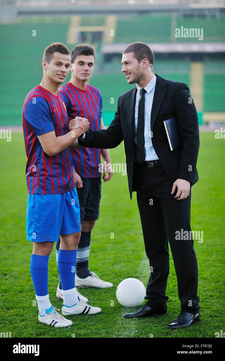 soccer sport manager in business suit coach and football player on ...