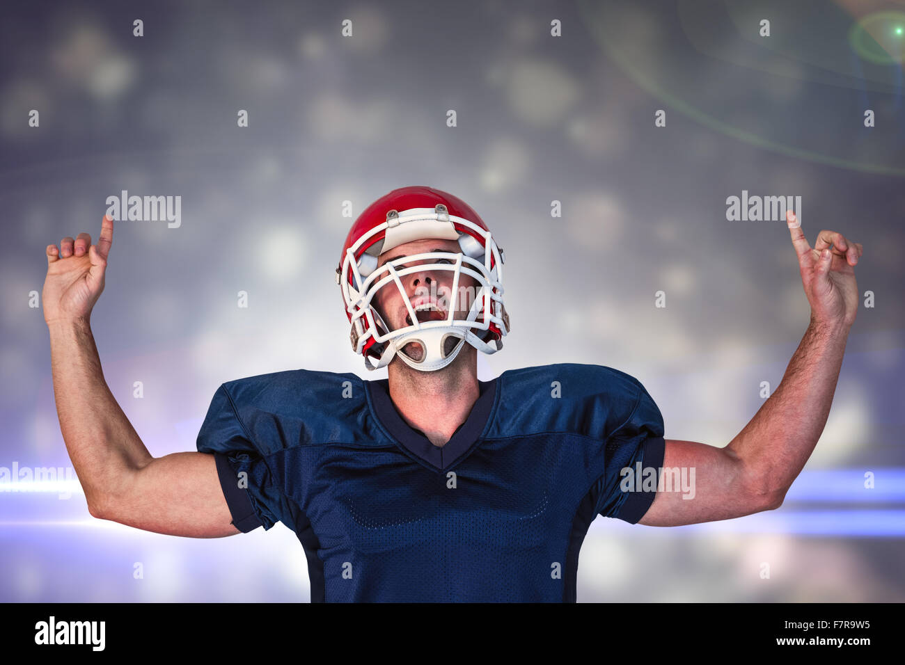 Composite image of rugby player celebrating while pointing up Stock ...