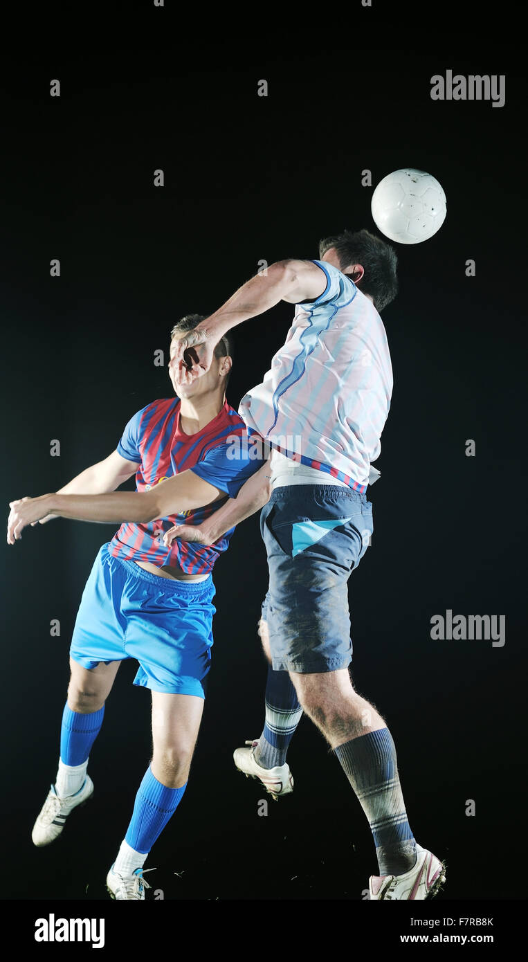 competition Action run and jump Duel of football players at soccer ball ...