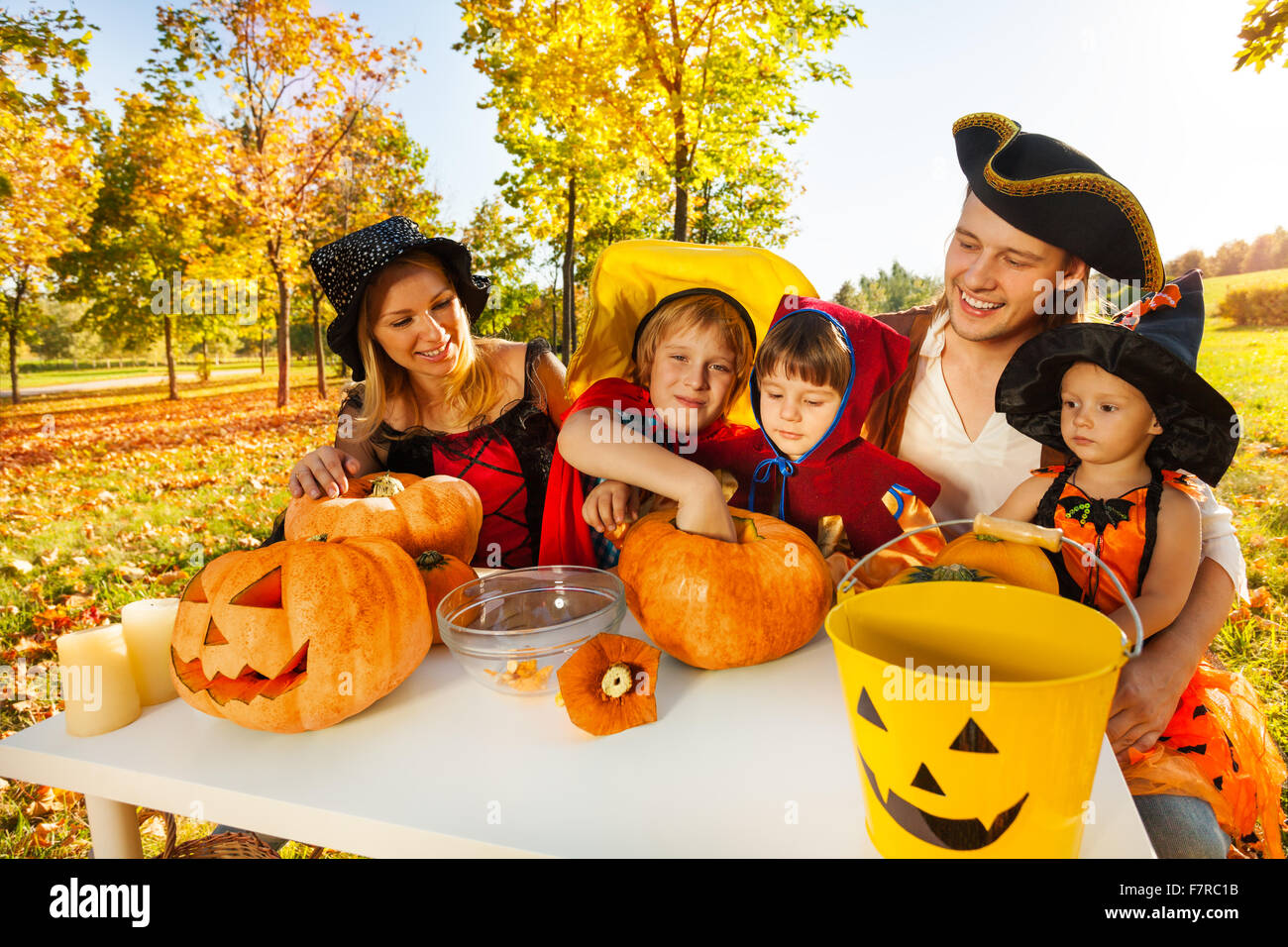 Family crafting Jack-O'-Lantern from pumpkin Stock Photo - Alamy