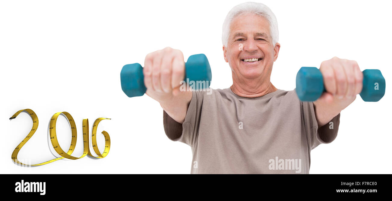Composite image of senior man lifting hand weights Stock Photo - Alamy