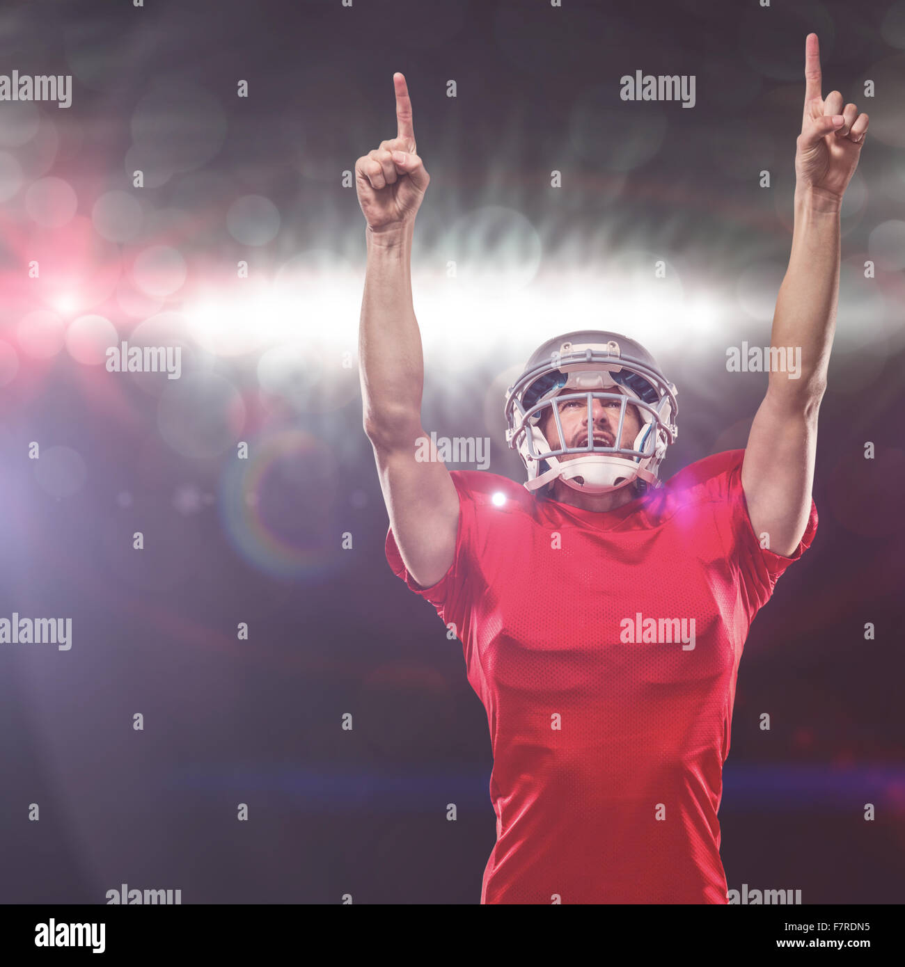Male football player arms raised hi-res stock photography and images ...