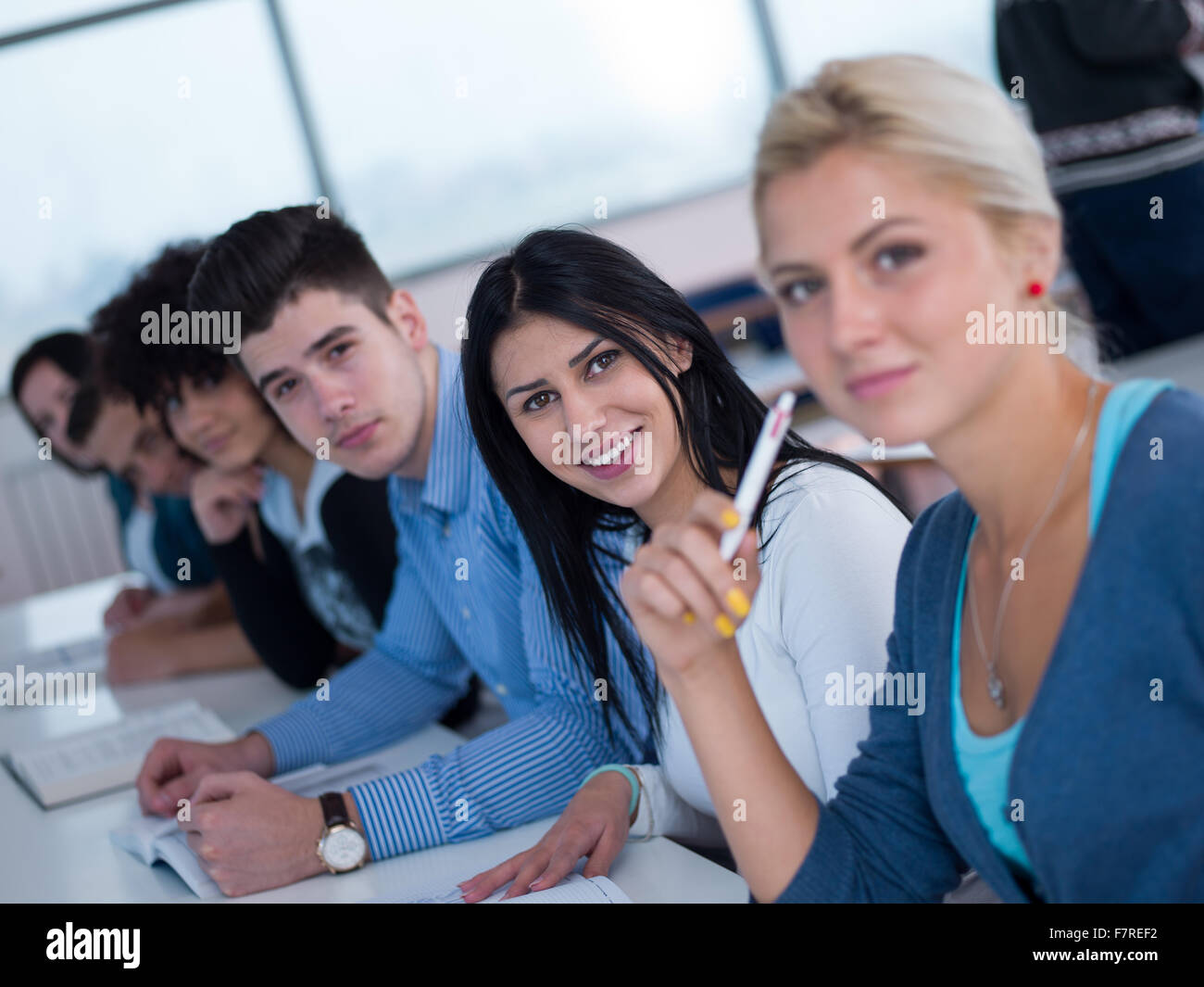 happy students group study in classroom Stock Photo - Alamy