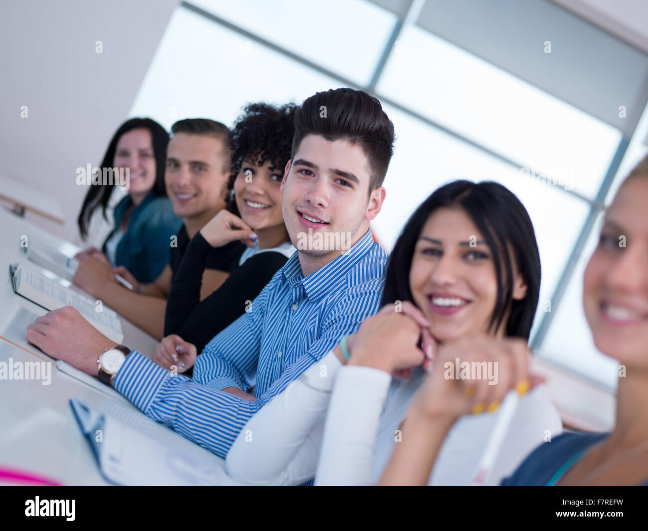 happy students group study in classroom Stock Photo - Alamy