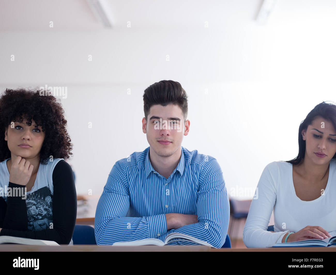 happy students group study in classroom Stock Photo - Alamy