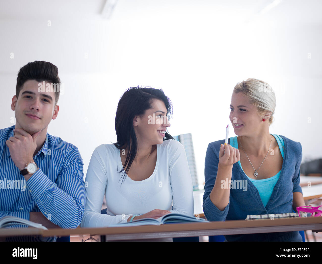happy students group study in classroom Stock Photo - Alamy