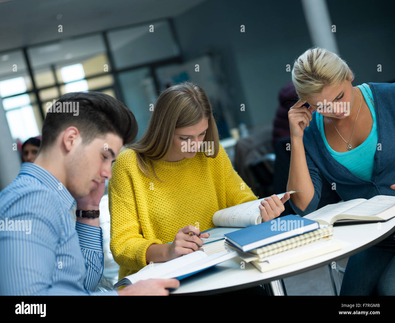 happy students group study in classroom Stock Photo - Alamy