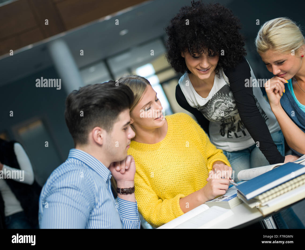 happy students group study in classroom Stock Photo - Alamy