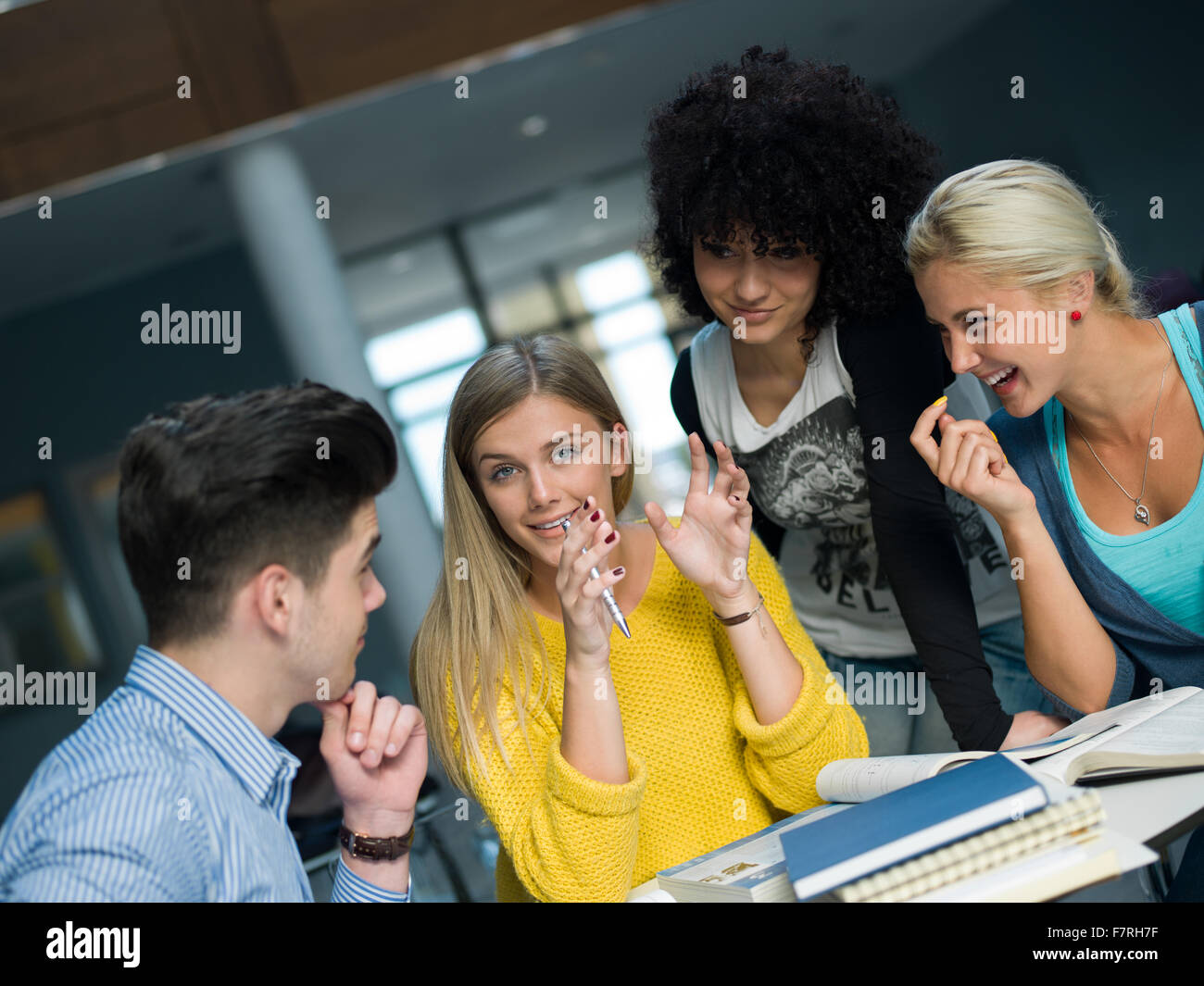 happy students group study in classroom Stock Photo - Alamy