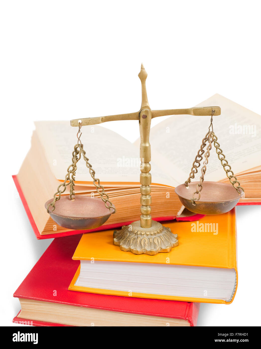 Scales of justice atop legal books over white Stock Photo - Alamy