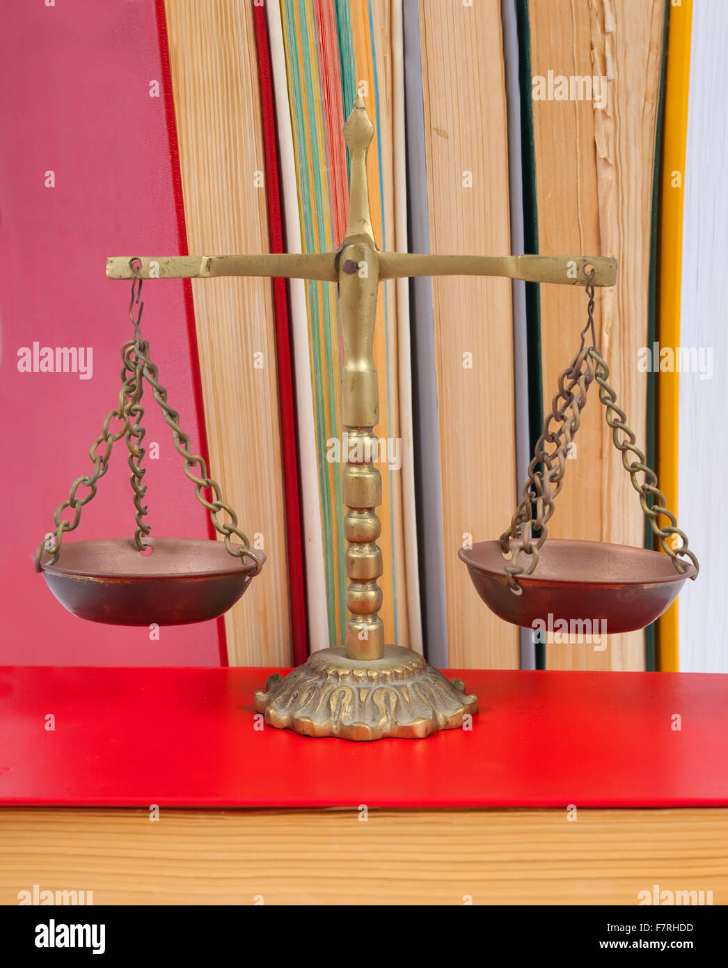 Scales of justice atop legal books, justice concept Stock Photo - Alamy