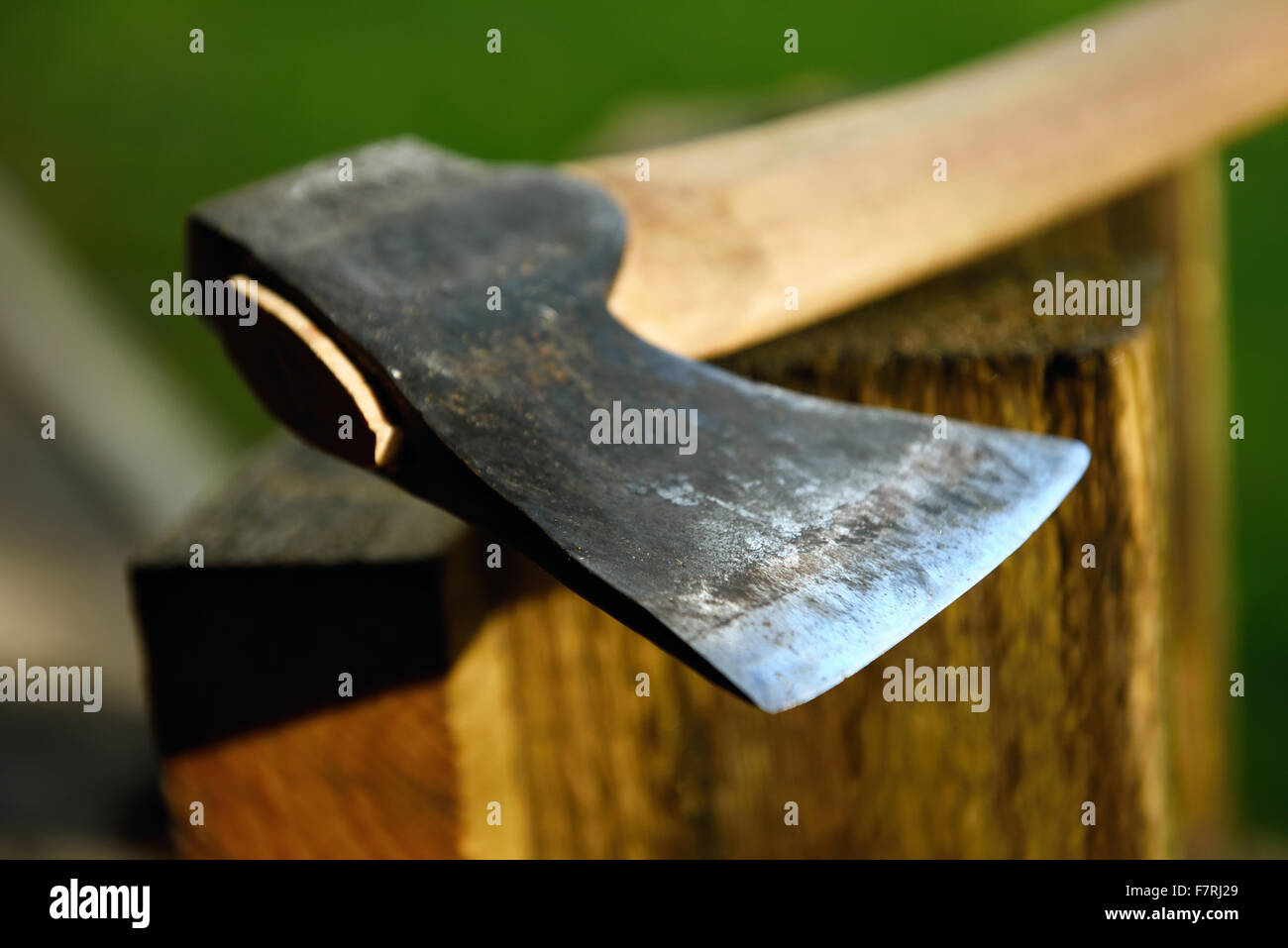 An axe at Footprint, Windermere, Cumbria. The straw bale building at ...