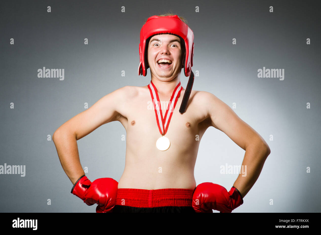 Funny boxer with winning gold medal Stock Photo - Alamy